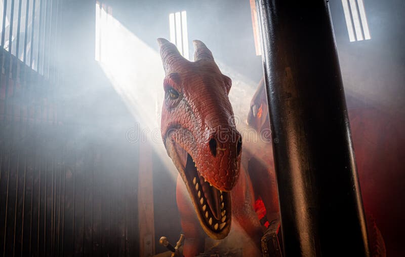 Bright Red Dragon in a Dungeon in England with Rays of Light through ...