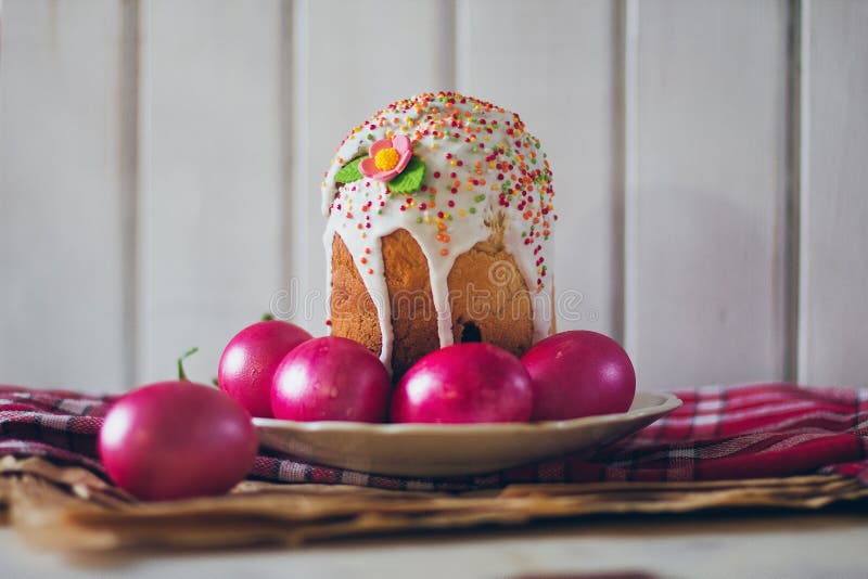 Bright Red Easter Eggs and Easter Bread on the Plate on the Checked Red ...