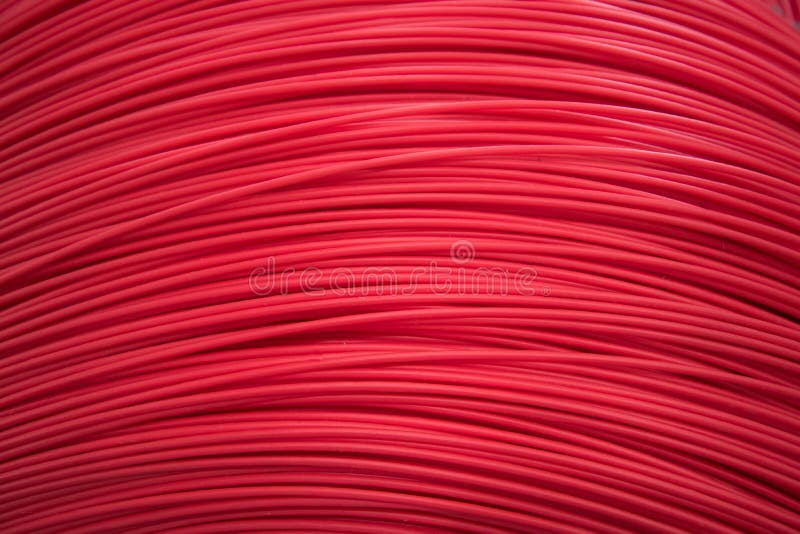 Bright Red Electric Wire in Large Quantities. a Coil of Wire ...