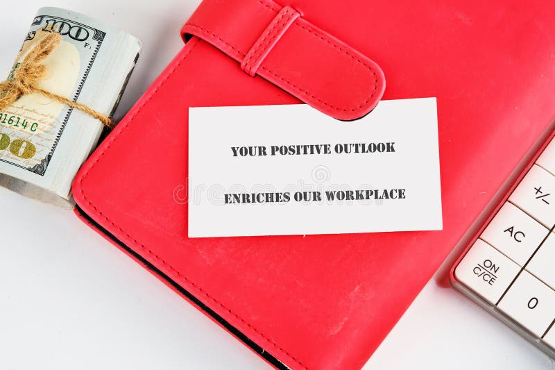 A Bright Red Folder Holds an Affirmation Card Stating that Positive ...