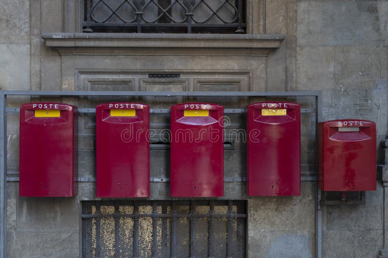 Bright Red Mail Boxes Lined Up Outside an Italian Post Office Stock ...