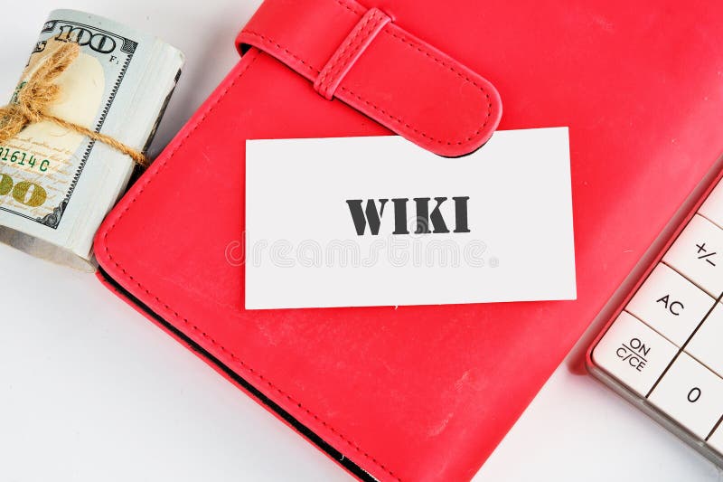 A Bright Red Notebook Holds a Label Reading WIKI Next To a Bundle of ...