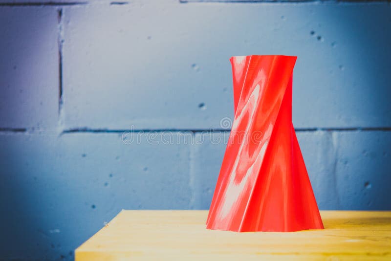 Bright Red Object Vase Printed by 3d Printer on Blue Brick Wall Stock ...