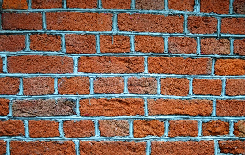 Bright Red Orange Brick Wall with Light Blue Paint between Bricks Stock ...