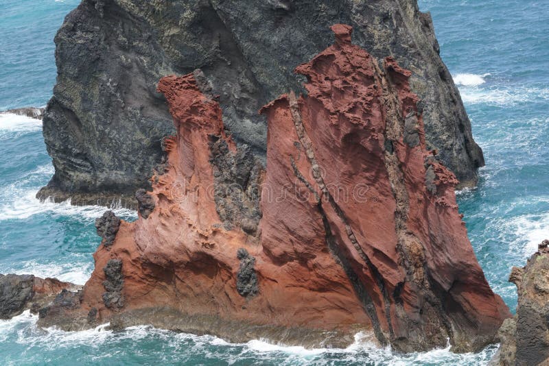 Red rock and ocean stock photo. Image of stones, rocks - 23669460