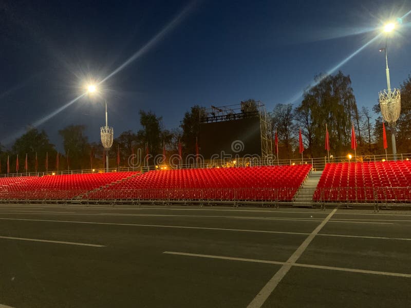 Bright red stadium seats stock photo. Image of africa - 251177696