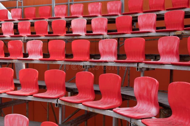 Bright red stadium seats stock image. Image of multiple - 89665537