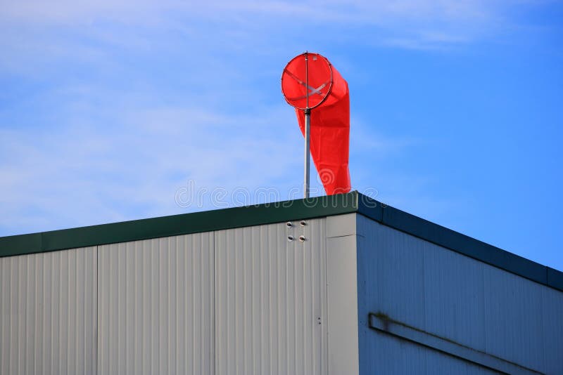 Bright Red Windsock stock photo. Image of attached, bright - 368373828
