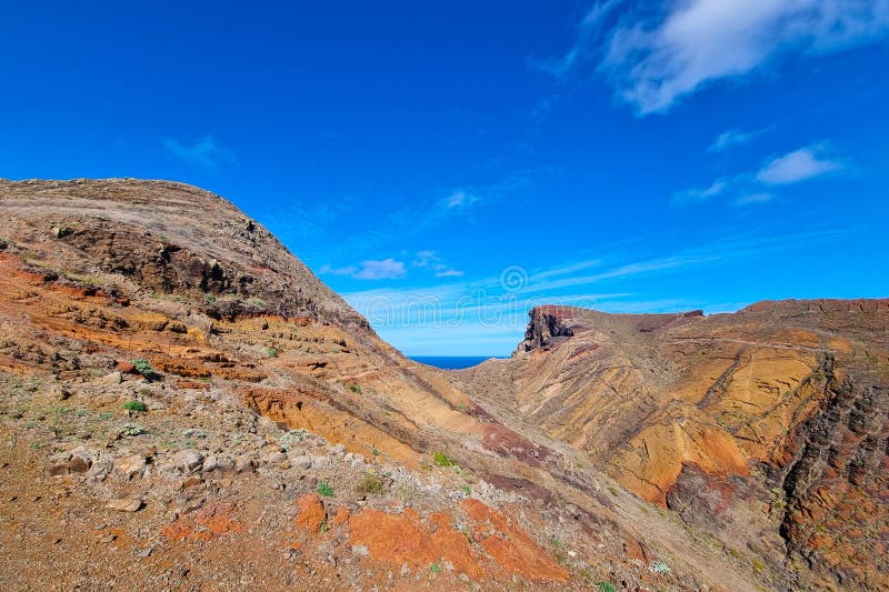 Bright Red Rocks Forming Barrier Along Charlottetown Harbour Stock ...