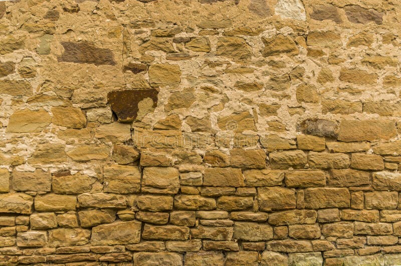 Bright Sandstone Wall with Dark Stone at the Top Not Grouted Dow Stock ...
