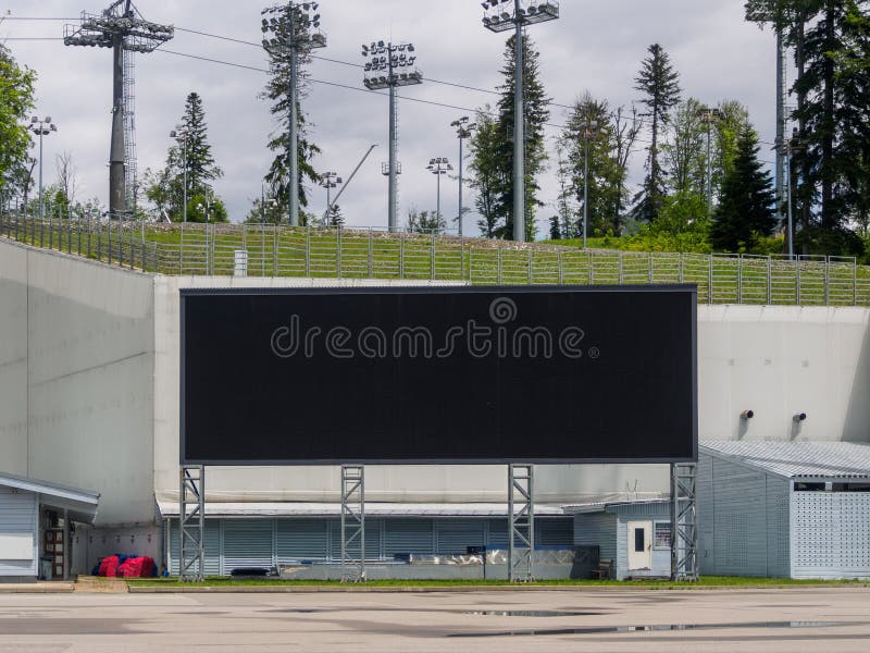 A Bright Screen in the Stadium Shows Exciting Moments of the Game ...