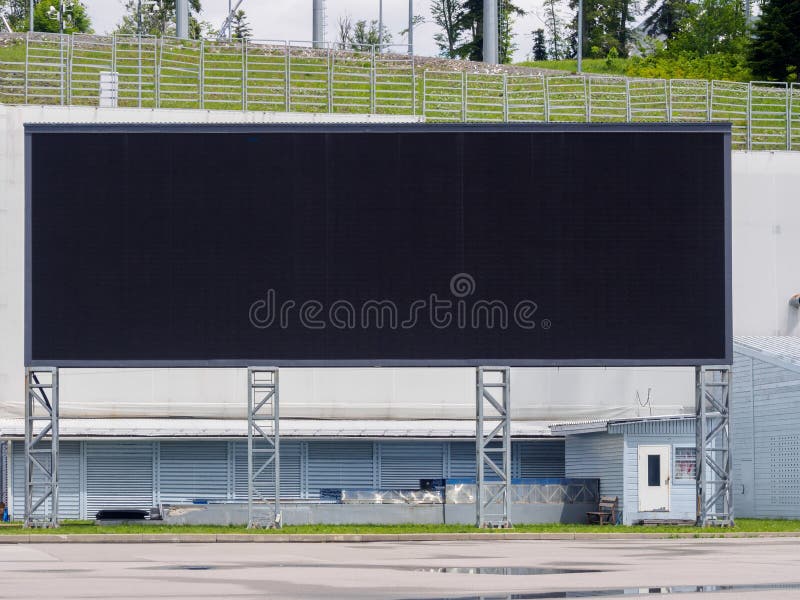 A Bright Screen in the Stadium Shows Exciting Moments of the Game ...