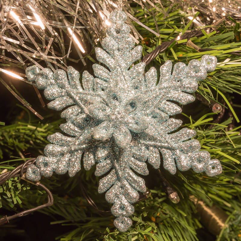 Bright Silver Six Point Star Decoration on Christmas Tree Stock Photo ...