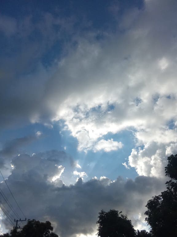 Bright Skylight with Colliding Clouds Stock Image - Image of cloud ...