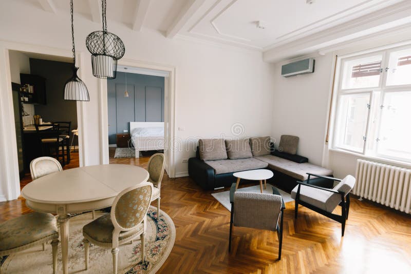 Bright Spacious Living Room with Chairs Table Inside Stock Image ...