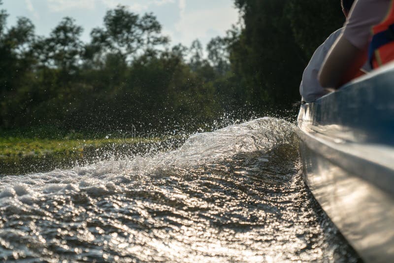 Bright Splash from River Water with Side Edge of Travel Speed Boat ...