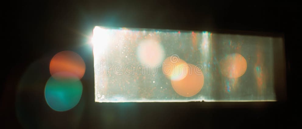Light Leaks Creating Vibrant Lens Flares Against a Black Background ...