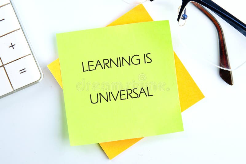 A Bright Sticky Note Displays the Phrase Learning is Universal, Placed ...