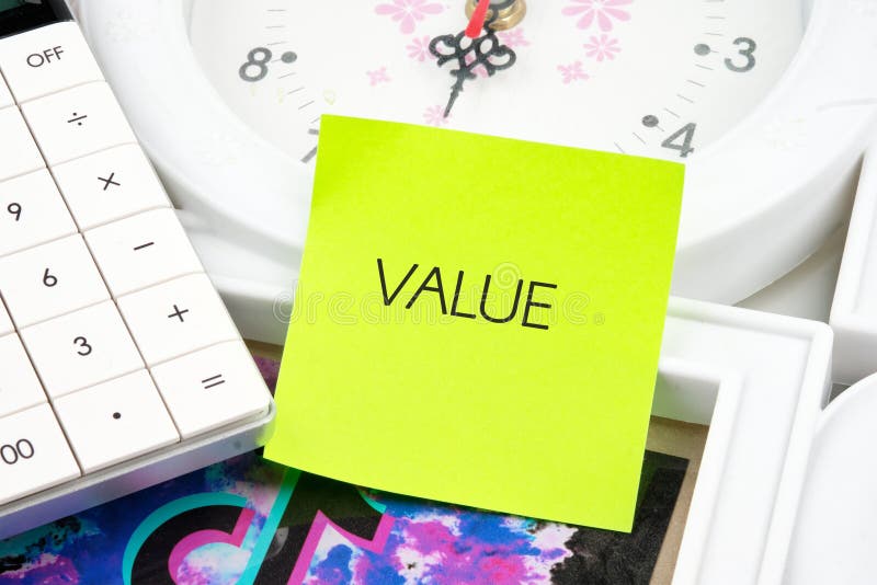 A Bright Sticky Note Displays the Word Value Alongside a Calculator and ...
