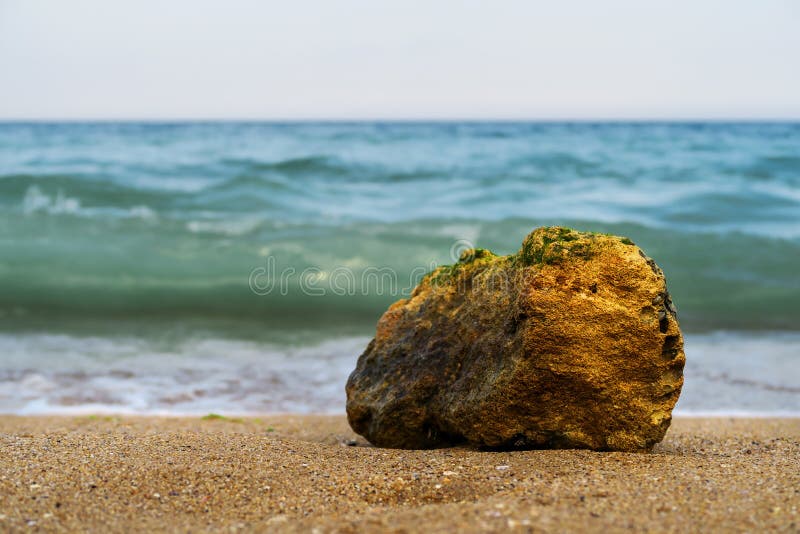 Bright Stone on the Seashore Stock Photo - Image of boulder, color ...