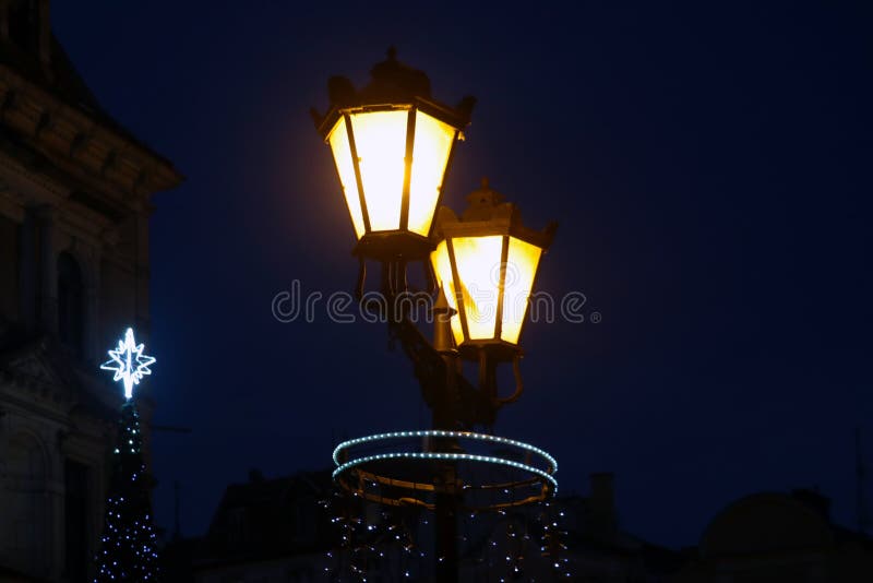 Bright Street Lighting is Lit in the Evening in the City. Stock Photo ...