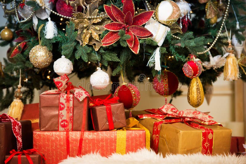 Lush Christmas Tree with Gold Ornaments Stock Photo - Image of bright ...