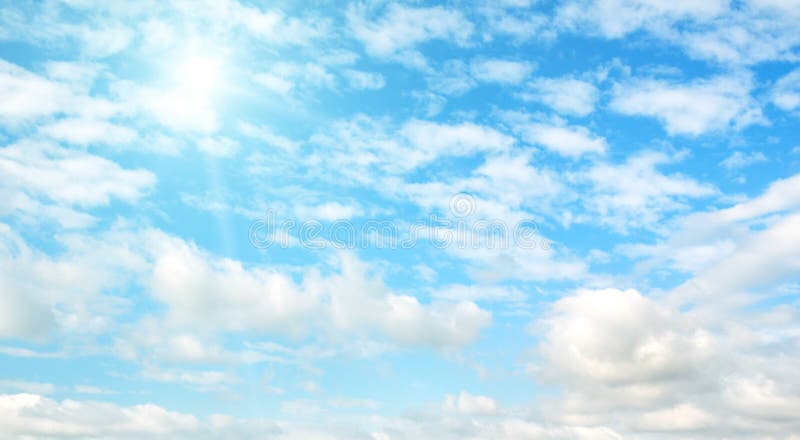 Bright Sun on Blue Sky with Clouds. Wide Photo Stock Image - Image of ...