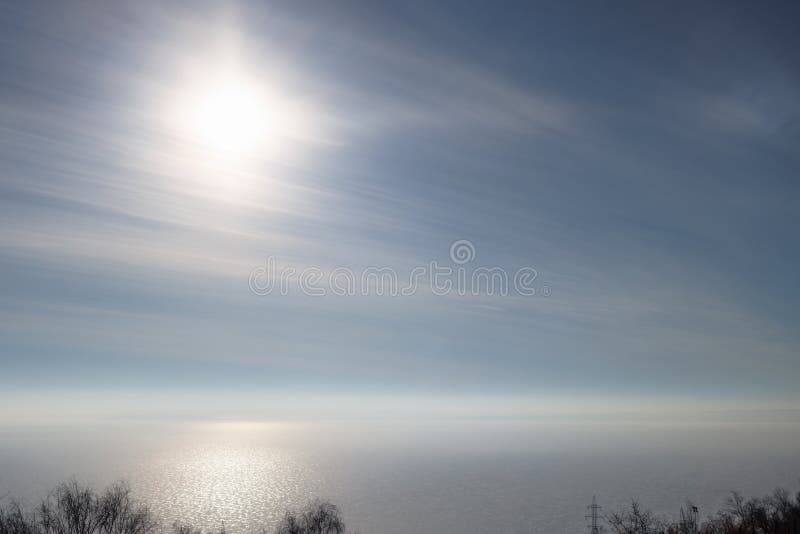 Bright sun in the blue sky stock photo. Image of trees - 268105830