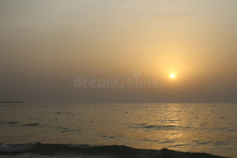 Bright Sun in Blurry Sunset Sky Shining Over the Arabian Sea Stock ...