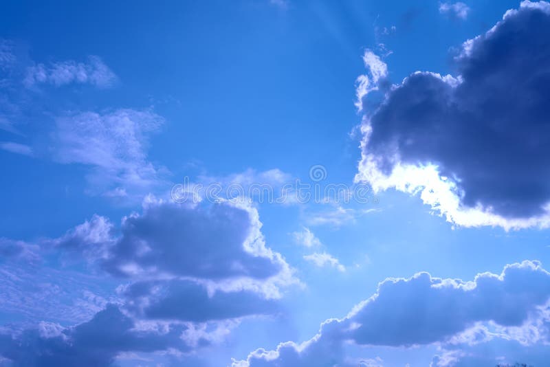 The Bright Sun Breaks through the White Cloud, the Rays of the Sun ...