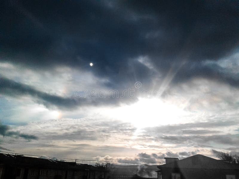 Sunset of two suns stock photo. Image of dramatic, lightning - 103903442