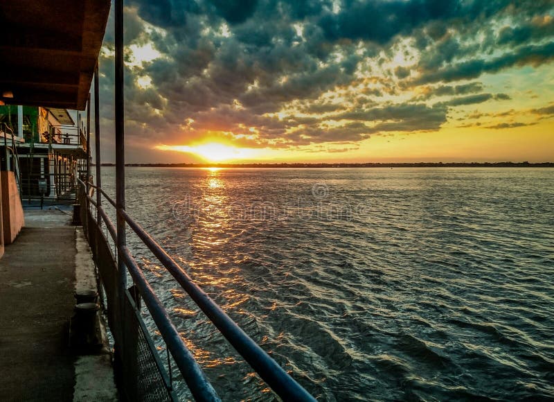 Bright Sun and Clouds Over the River Stock Photo - Image of dark ...