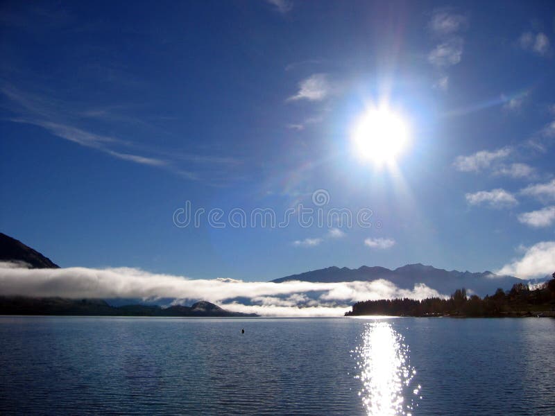 Bright sun and lake stock image. Image of lake, blue, mountain - 338349