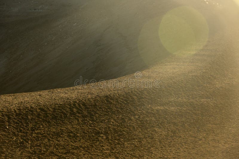 Bright Sun Light Bursts Over the Rim of Cinder Cone Stock Image - Image ...