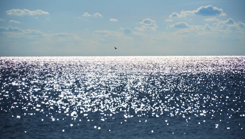 Bright Sun Light Reflection in Sea, Sky and Clouds As Background during ...