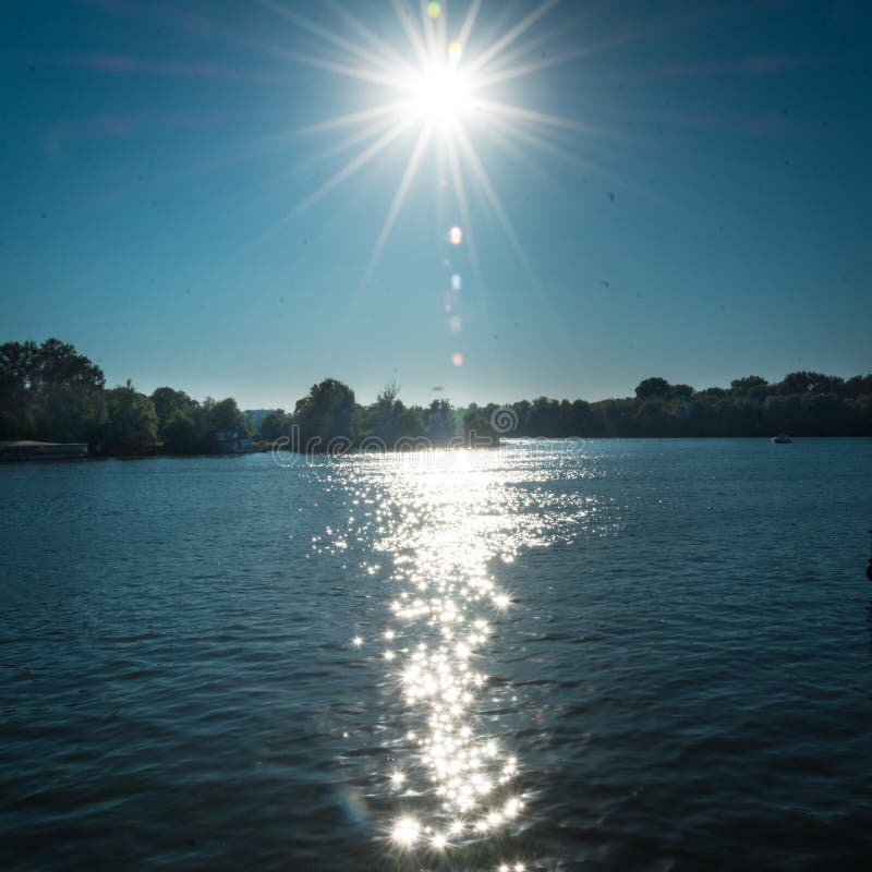 Bright Sun Over the River Danube. Blue Sky and Blue Water Stock Image ...