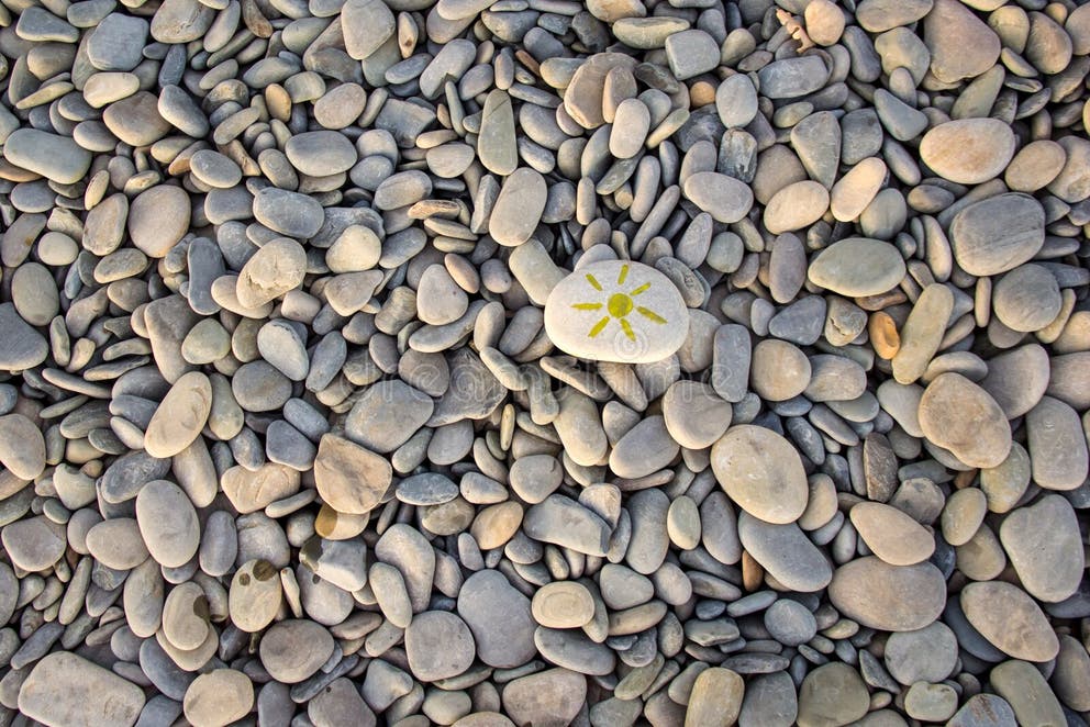 Bright Sun Painted on Pebble. Pebbles Background Stock Photo - Image of ...