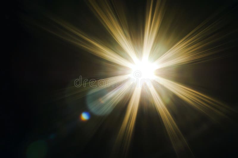 Bright Sun Rays Shine through a Clear Sky Illuminating a Dark Landscape ...