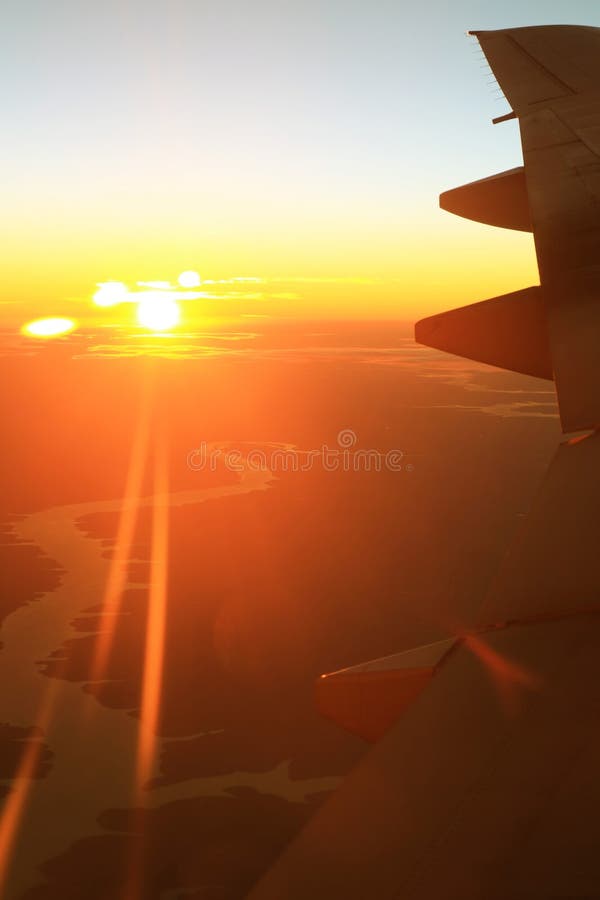 Bright Sun Rising with Stunning Sunbeams As Seen from the Plane Window ...