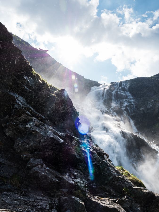 Waterfall and lens flare stock photo. Image of stream - 124639540