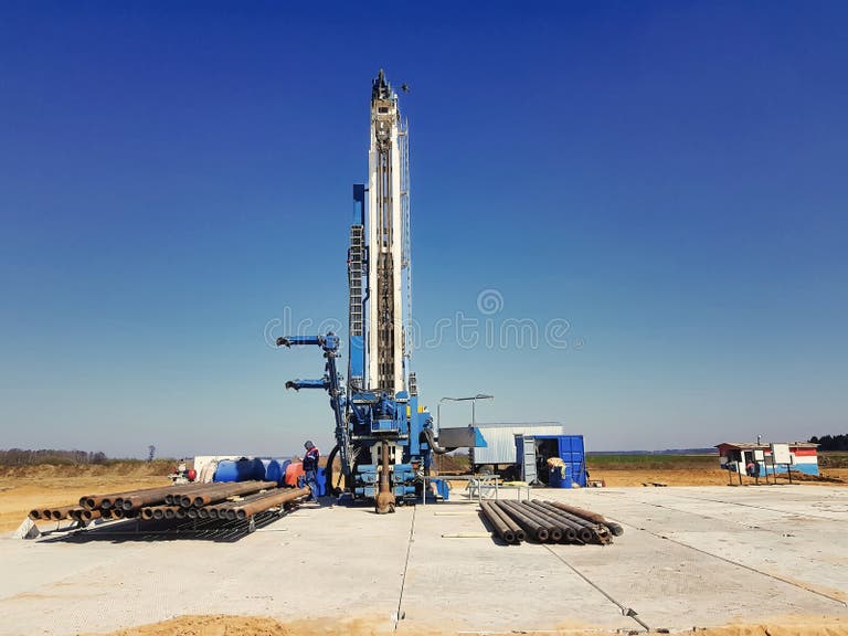 Heavy Machinery at Work on a Sunny Day in a Remote Drilling Site with ...