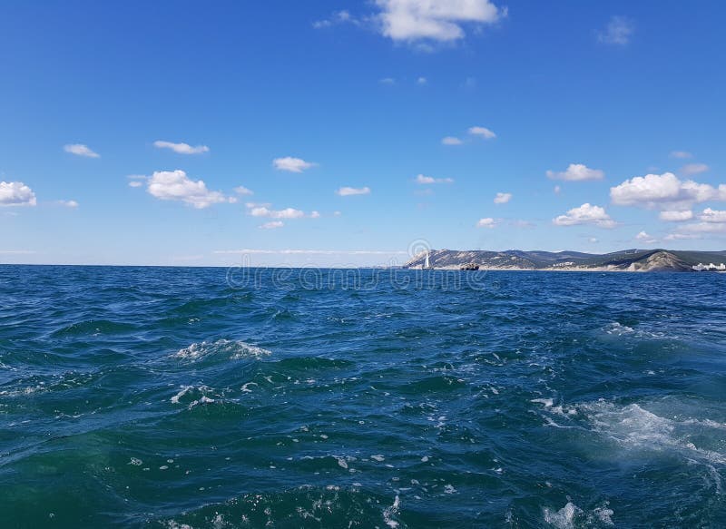 Bright sunny day at sea stock photo. Image of ocean - 243201836