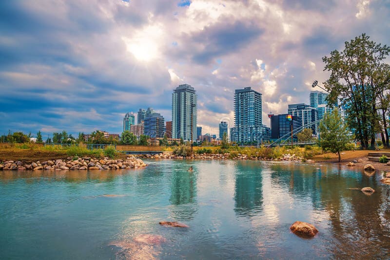 Sunny Cloudy Sky Over a Downtown Calgary Park Editorial Image - Image ...