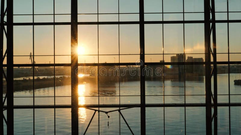 Bright Sunrise Behind the Glass Windows of an Office Building Stock ...