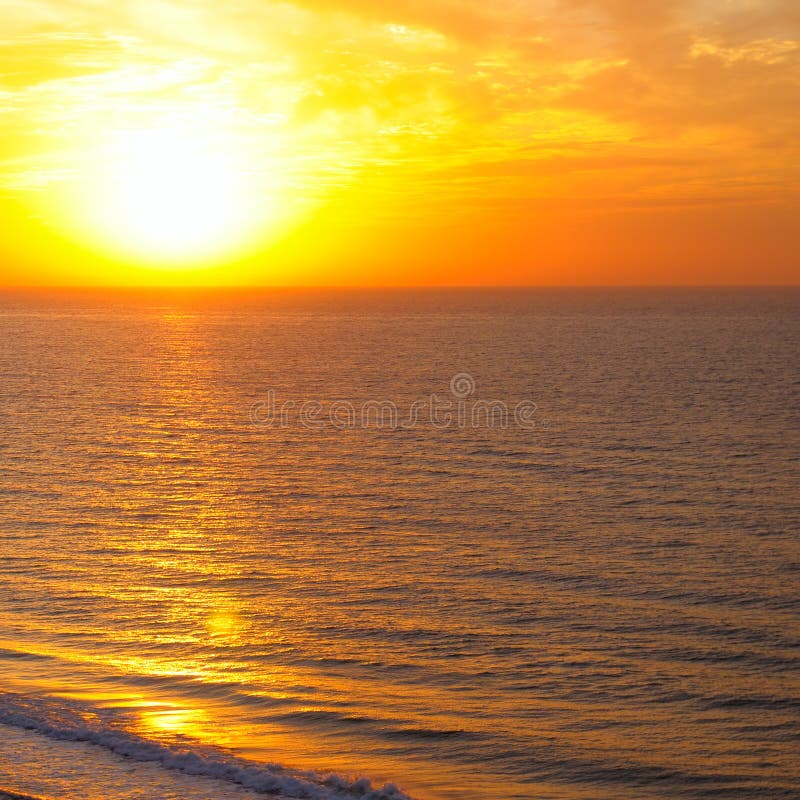Bright sunrise over ocean stock photo. Image of summer - 99799750