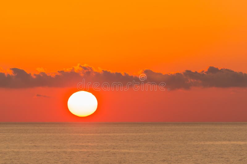Bright sunrise by the sea stock photo. Image of reflection - 106637362
