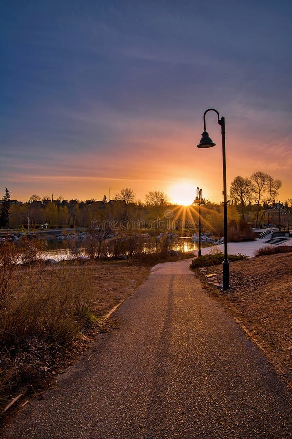 Sunrise Shining Over a Park Pathway Stock Image - Image of landscape ...