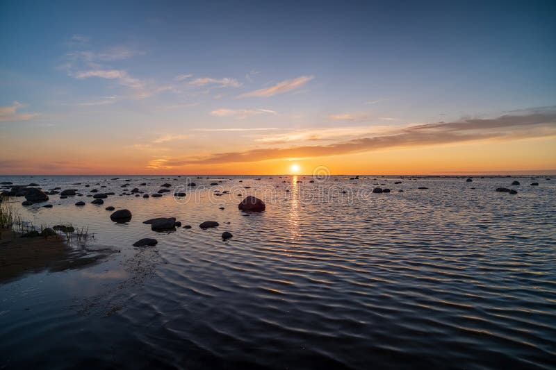 Bright Sunset with Large Yellow Sun Under the Sea Surface. Stock Image ...