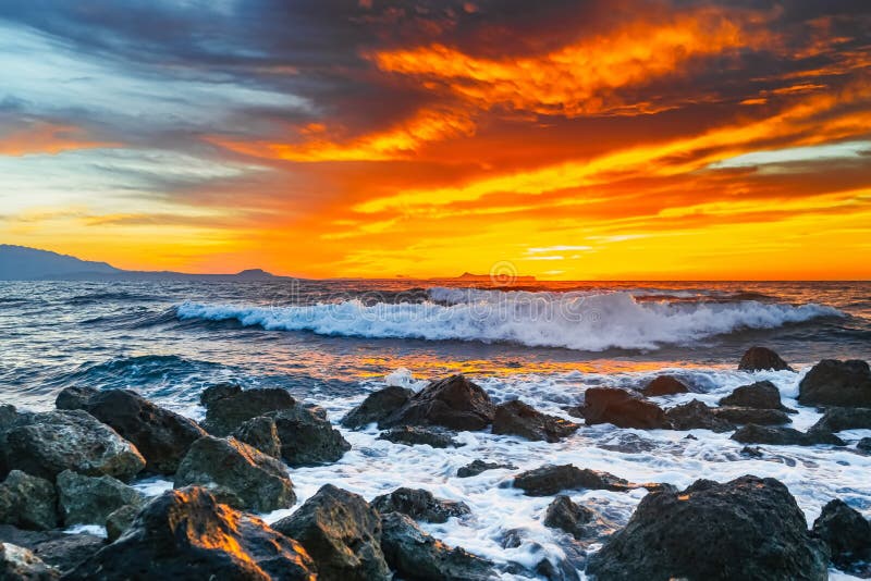 Bright Sunset Under the Storm Sea with Waves Splashes Stock Photo ...