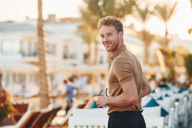 Bright Sunshine. Young Man is Outdoors at Sunny Daytime Stock Image ...